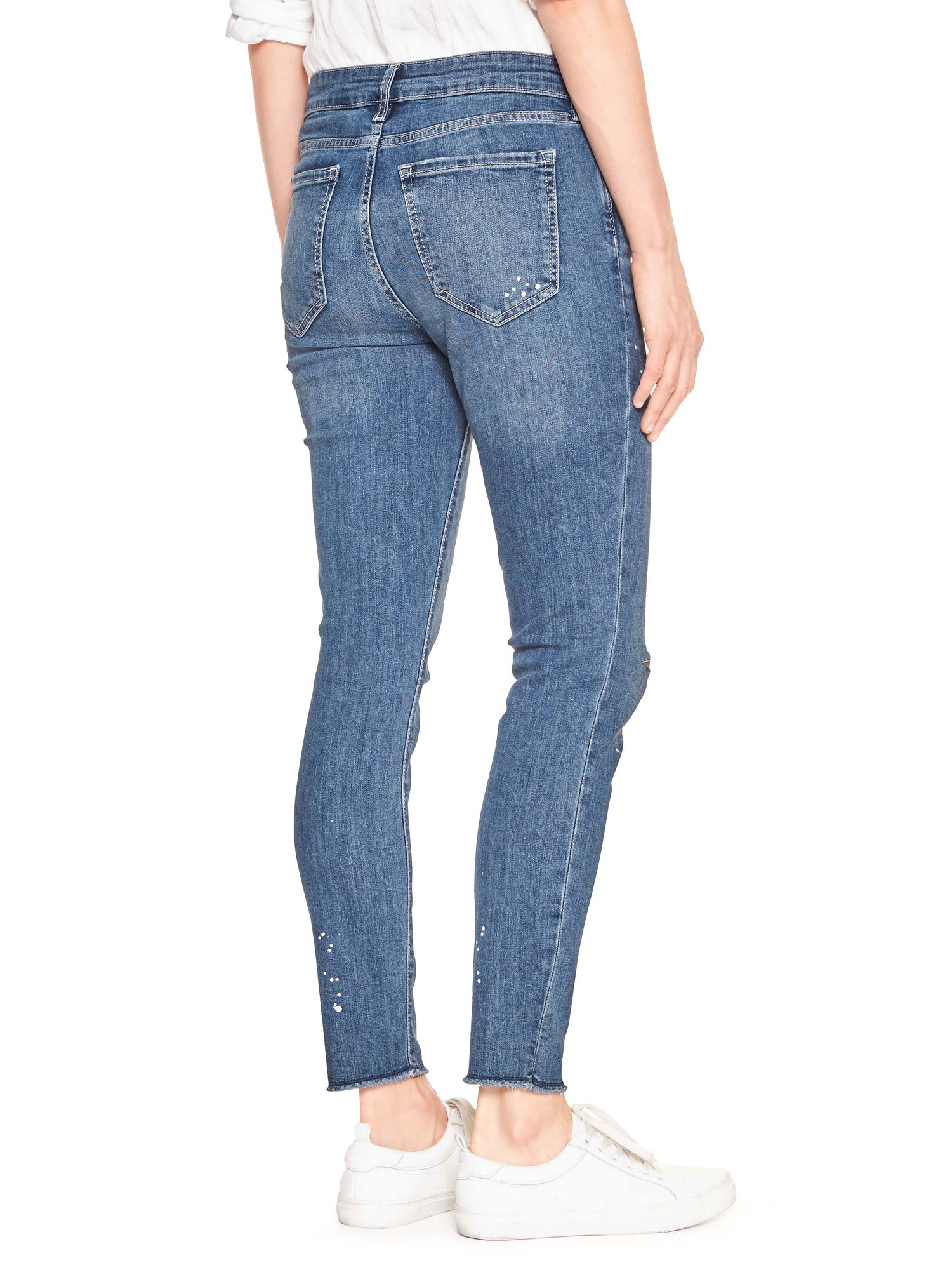 Mid rise destructed paint splatter jegging skimmer | Gap Factory